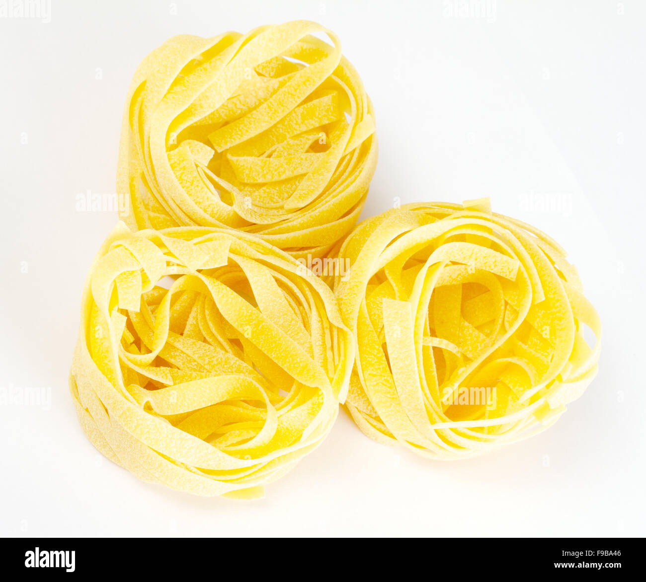 dried italian pasta (macaroni) isolated on white background Stock Photo ...