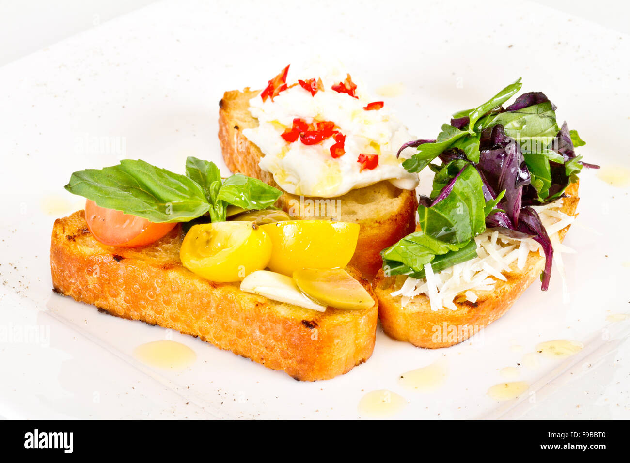 different colored Canapes on a white background Stock Photo - Alamy