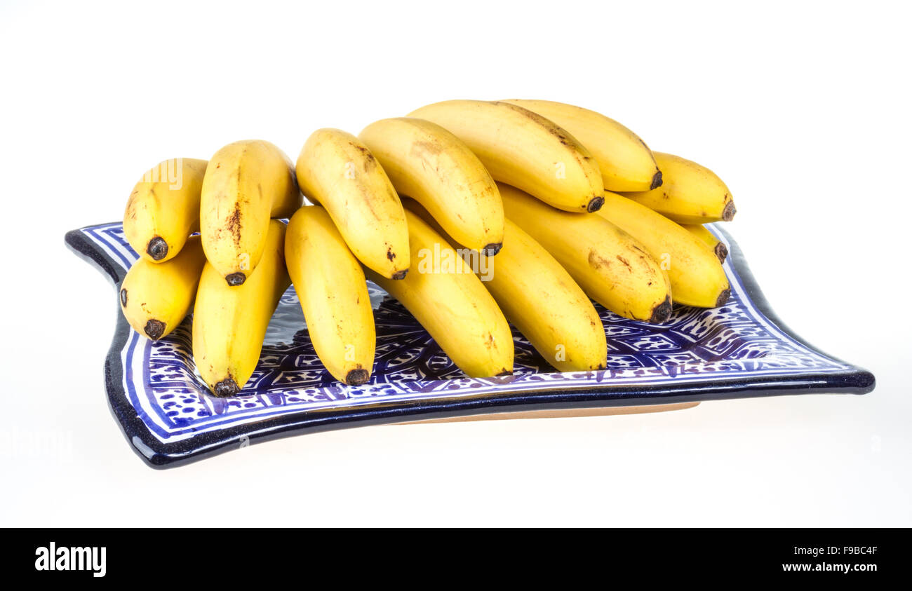 Mini bananas isolated on a white background Stock Photo - Alamy