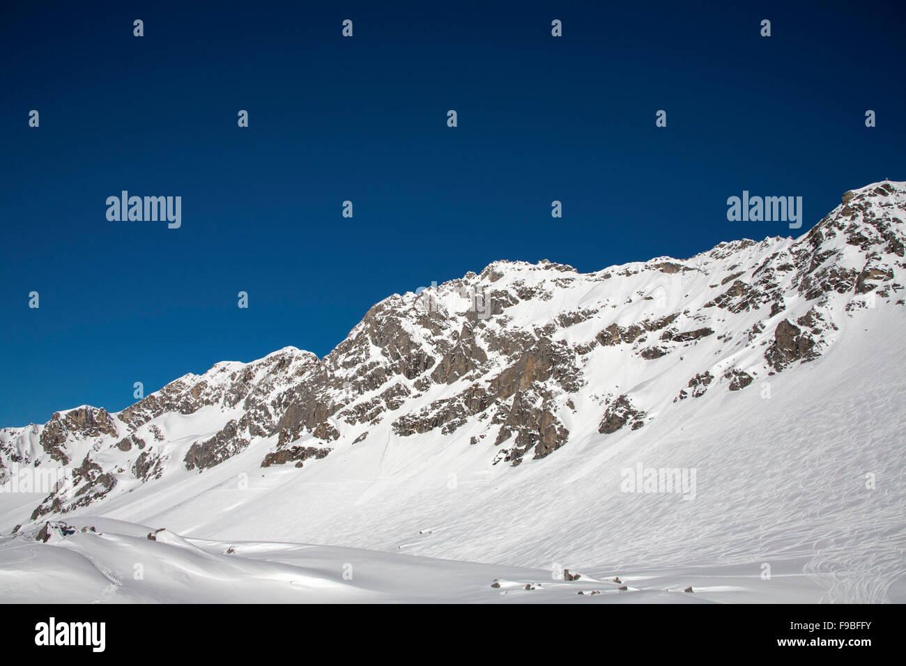 Snow covered cliff faces benneath the summit of Valluga from The ...