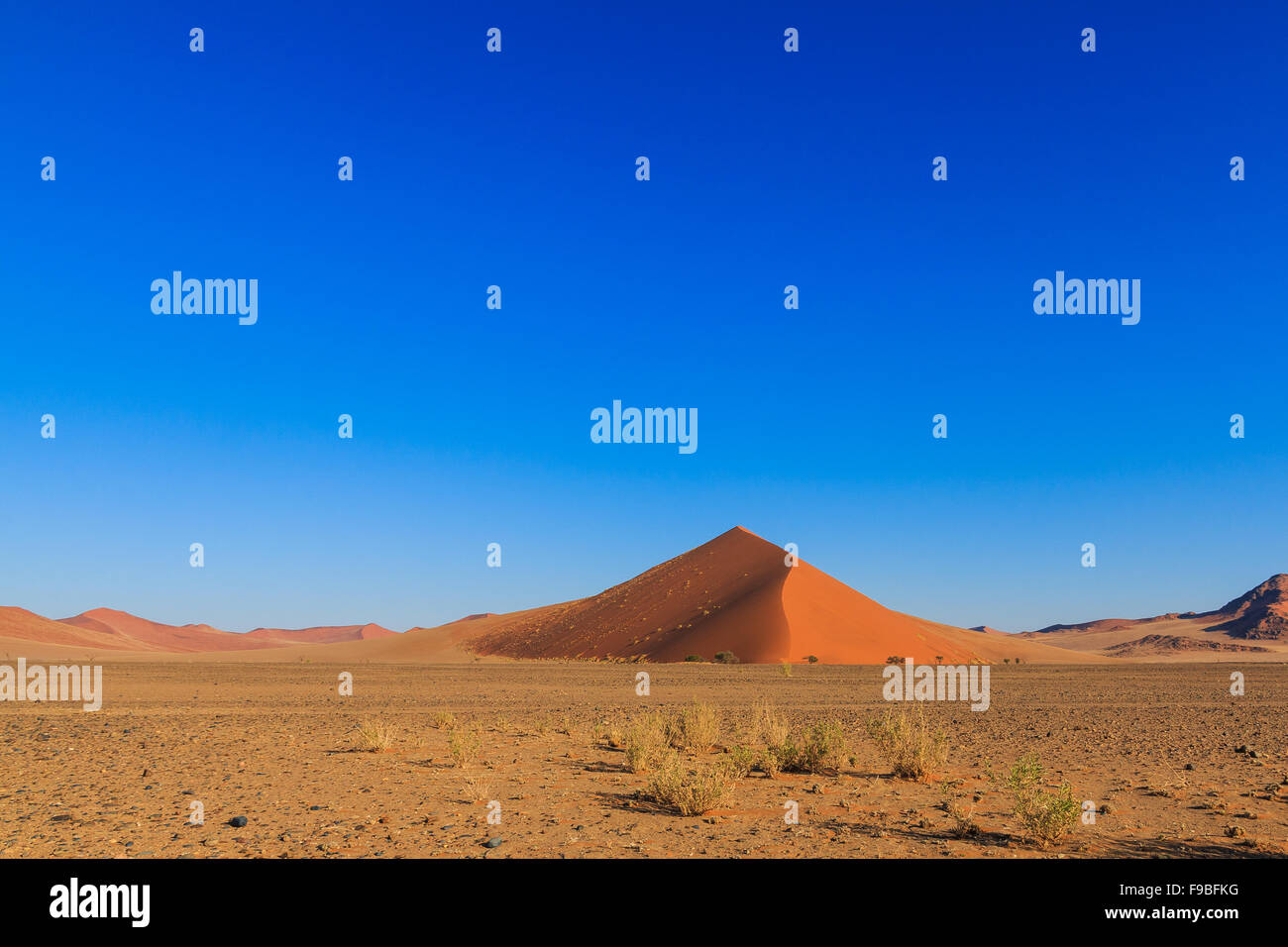 Blue sky above red sand dune landscape desert Sossusvlei, Namibia ...