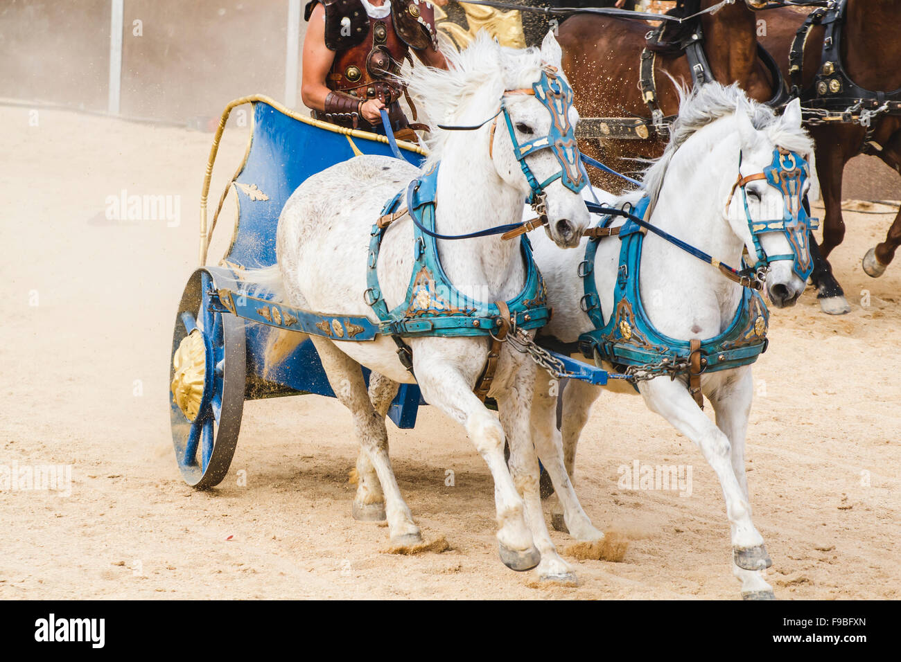 War, Roman chariot in a fight of gladiators, bloody circus Stock Photo ...