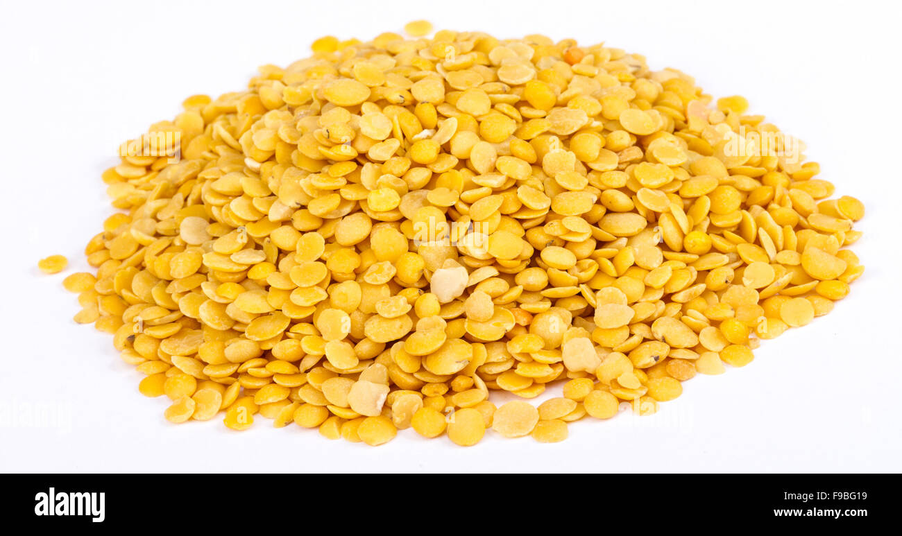 Yellow lentils isolated on white background.Macro shot Stock Photo - Alamy
