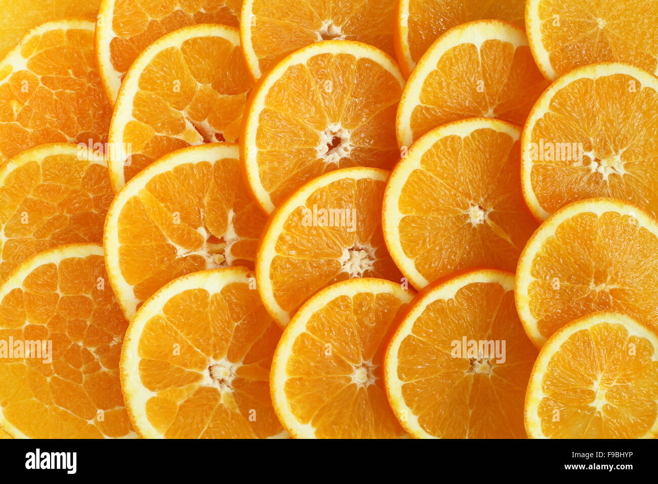 Food background - slices of ripe orange fruit Stock Photo - Alamy