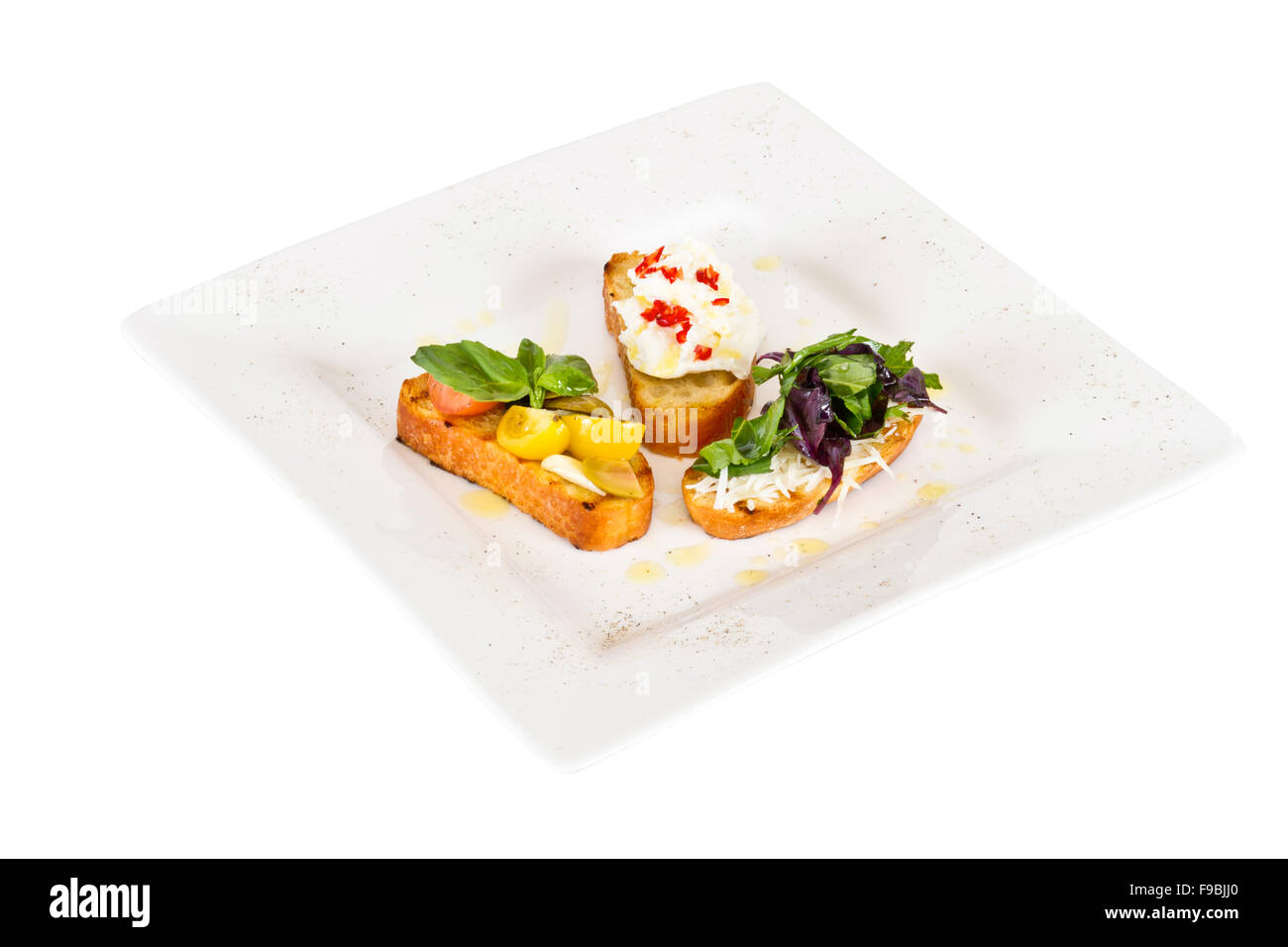 different colored Canapes on a white background Stock Photo - Alamy