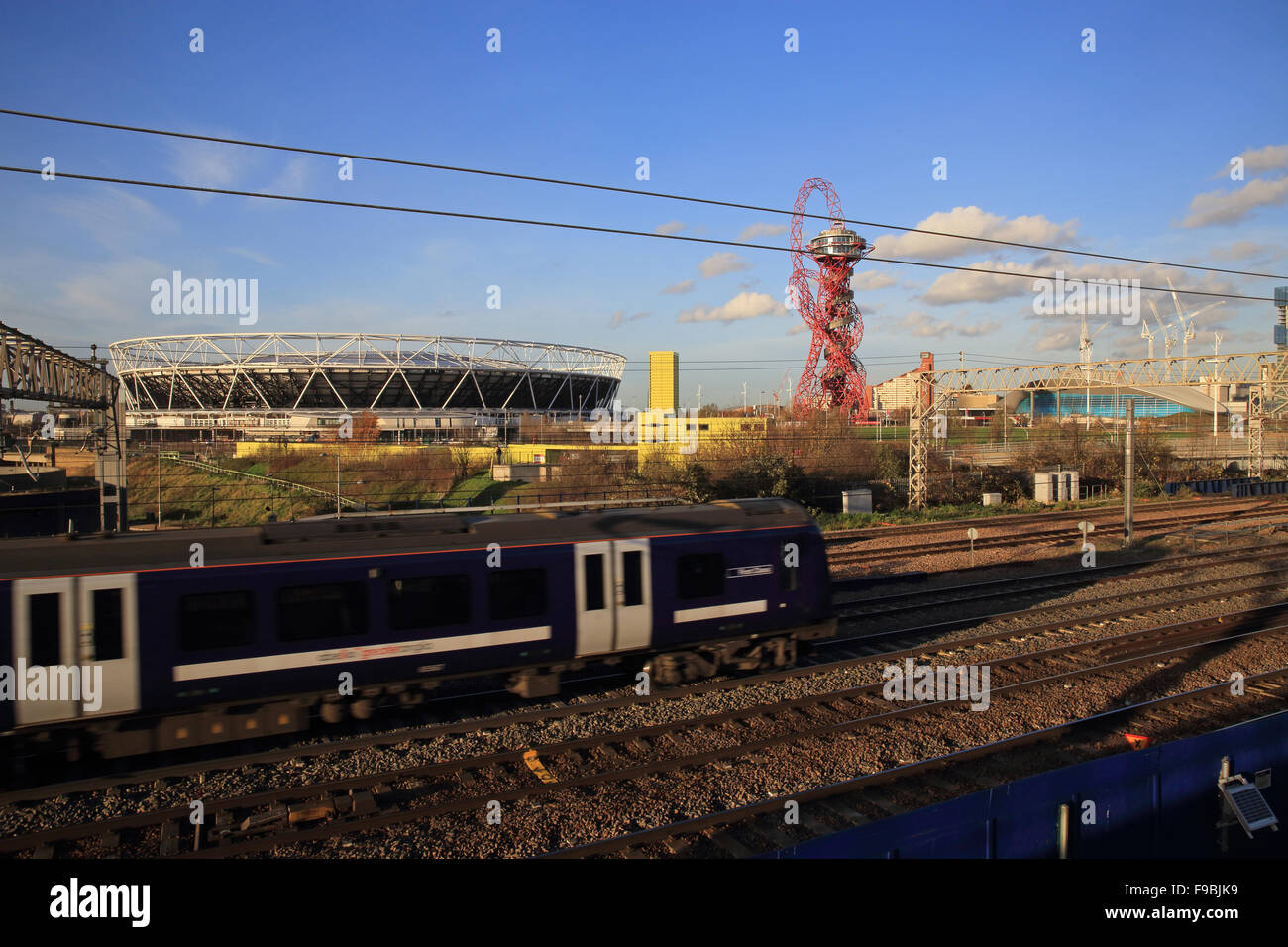 Train passing the Queen Elizabeth Park stadium, future home of West Ham ...