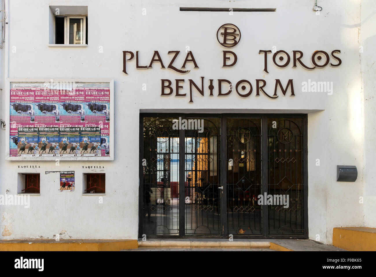 Benidorm plaza d toros bull ring, Spain, entrance with posters on wall ...