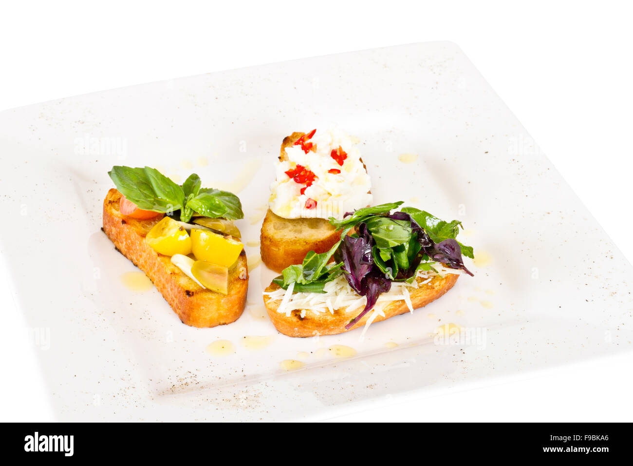 different colored Canapes on a white background Stock Photo - Alamy