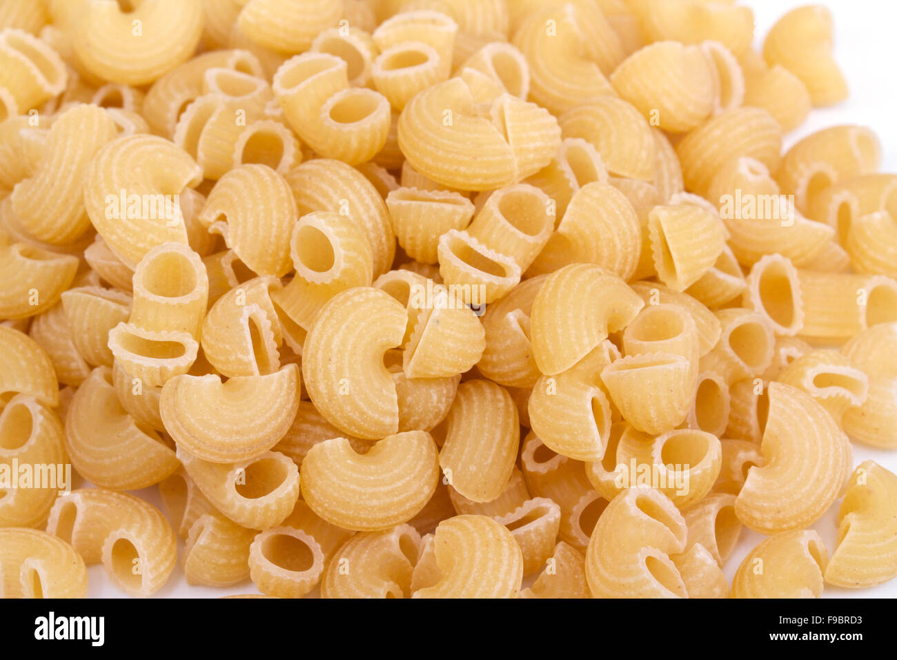 close up of a dried italian pasta on white background Stock Photo - Alamy