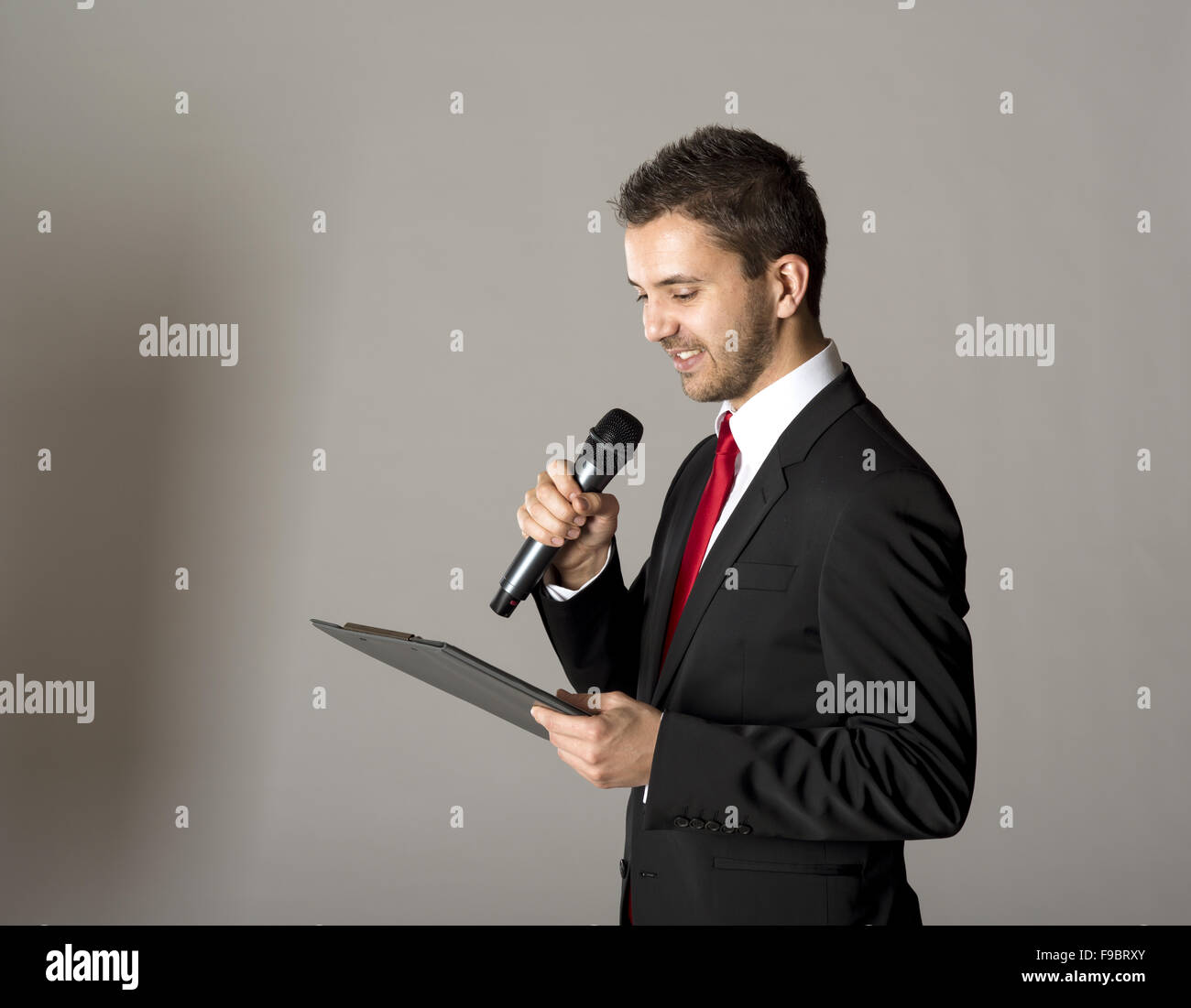 Handsome businessman is speaking on conference in hotel Stock Photo - Alamy