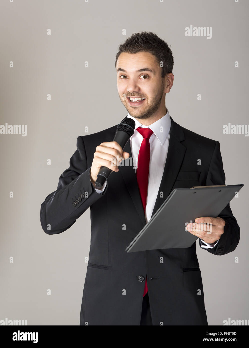 Handsome businessman is speaking on conference in hotel Stock Photo - Alamy
