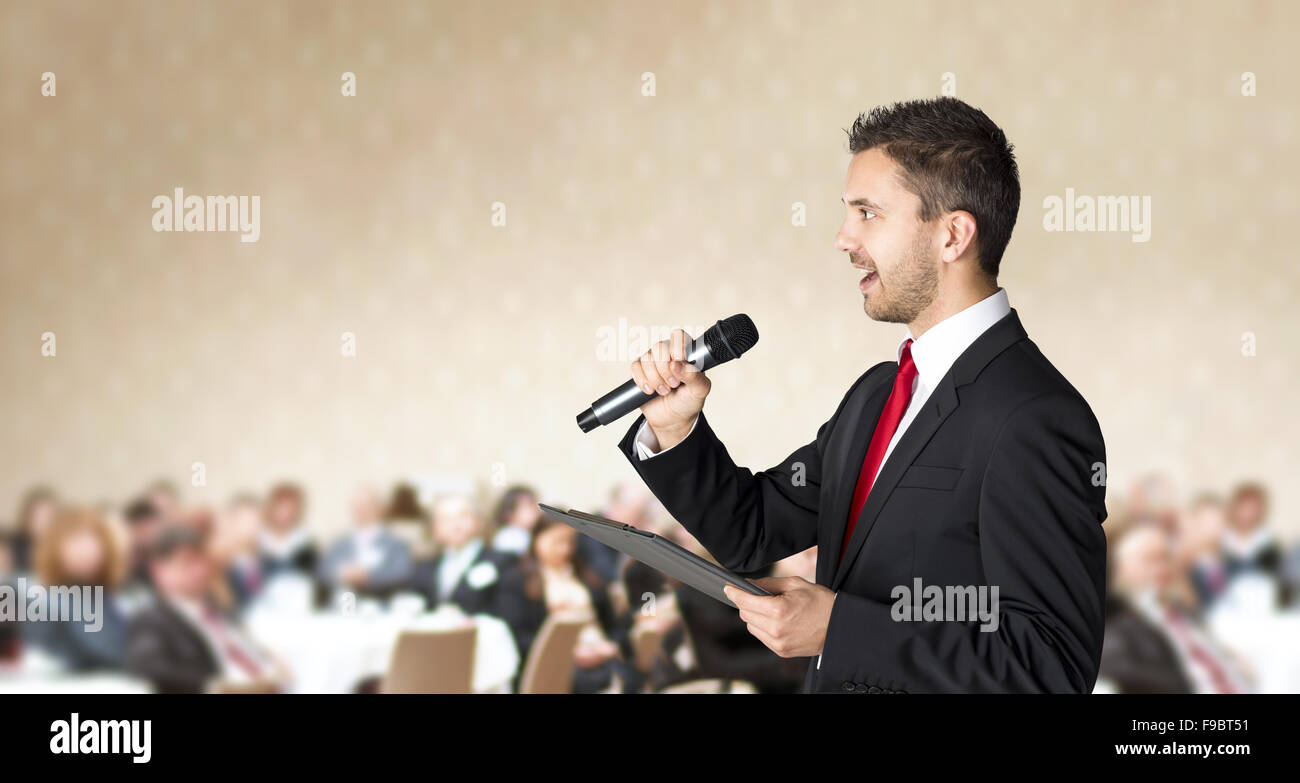 Man is speaking on indoor business conference for managers Stock Photo ...