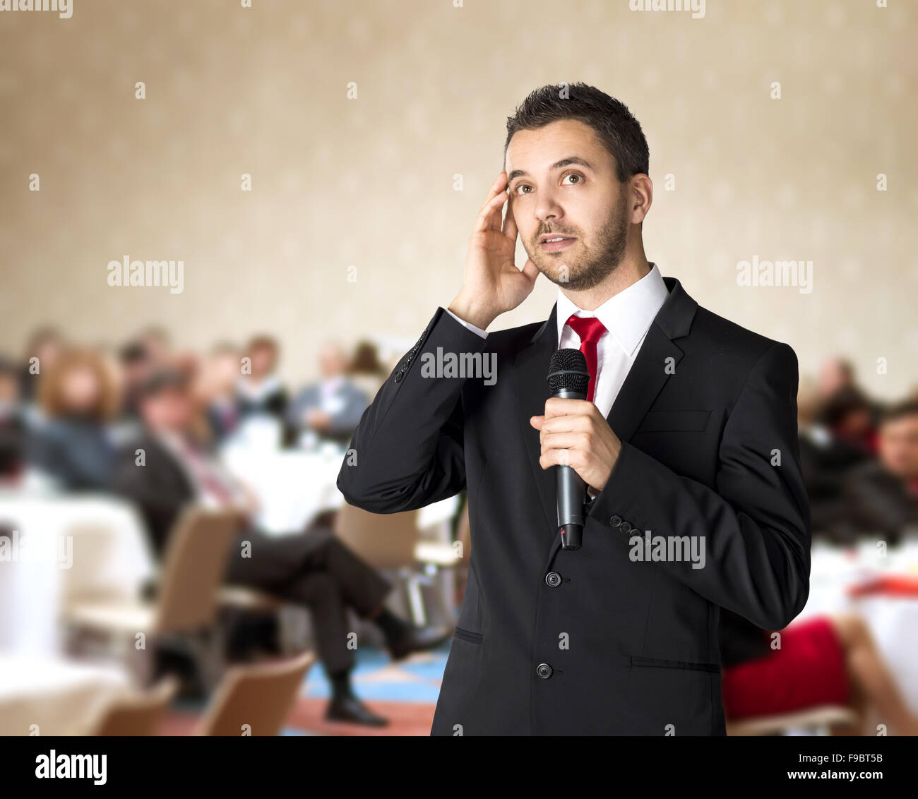 Man is speaking on indoor business conference for managers Stock Photo ...