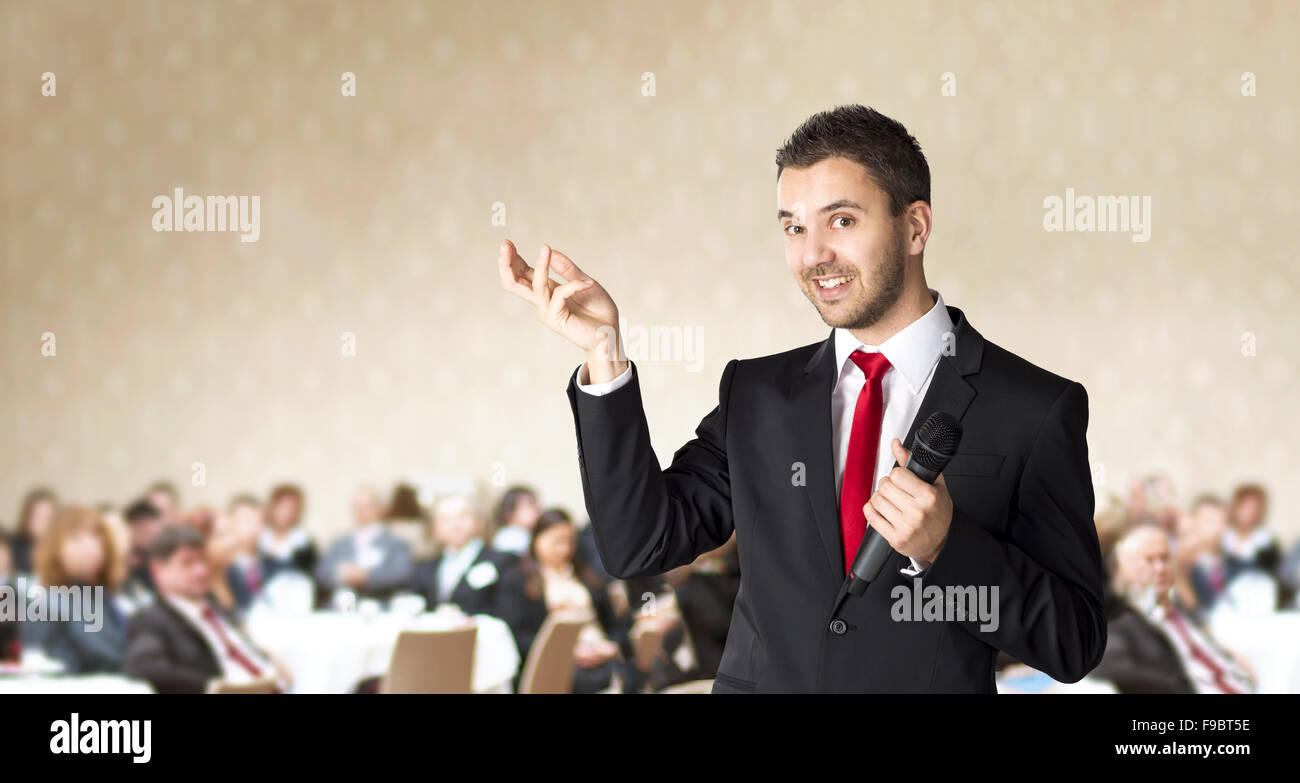 Man is speaking on indoor business conference for managers Stock Photo ...