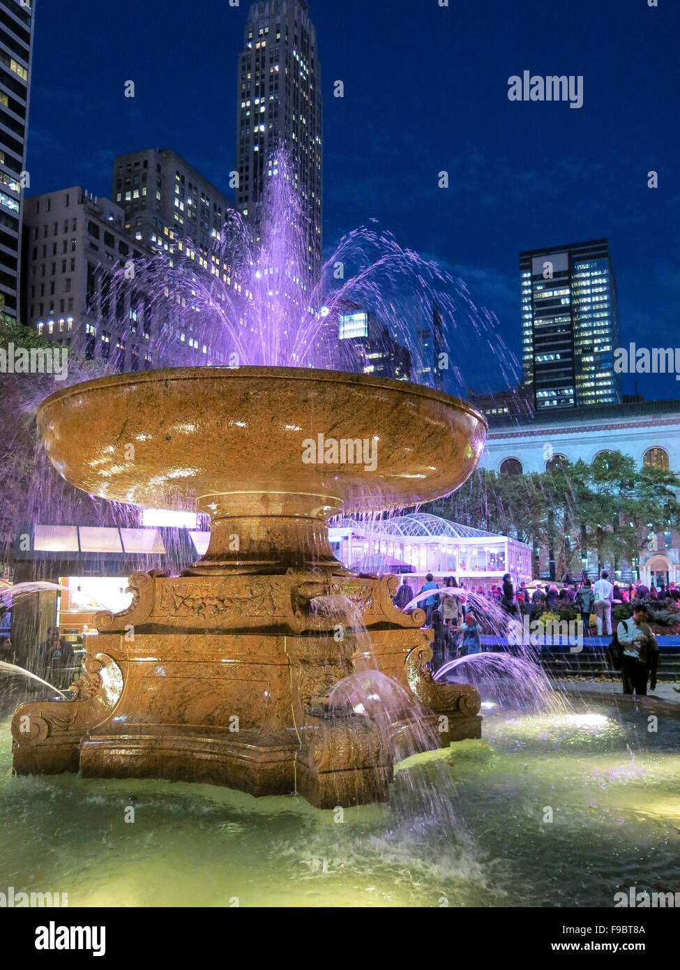 The Josephine Shaw Lowell Memorial Fountain is lit at night in Bryant ...
