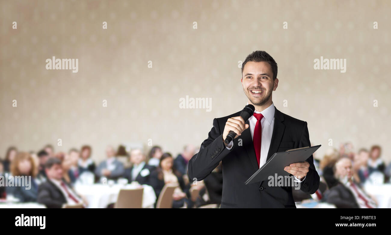 Man is speaking on indoor business conference for managers Stock Photo ...