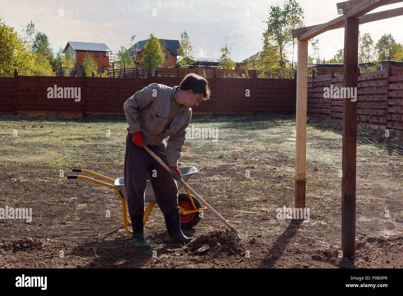 Man and rake hi-res stock photography and images - Alamy