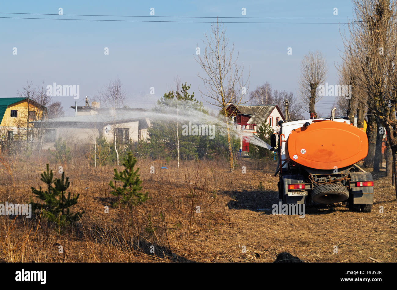 Water sprinkling on road hi-res stock photography and images - Alamy