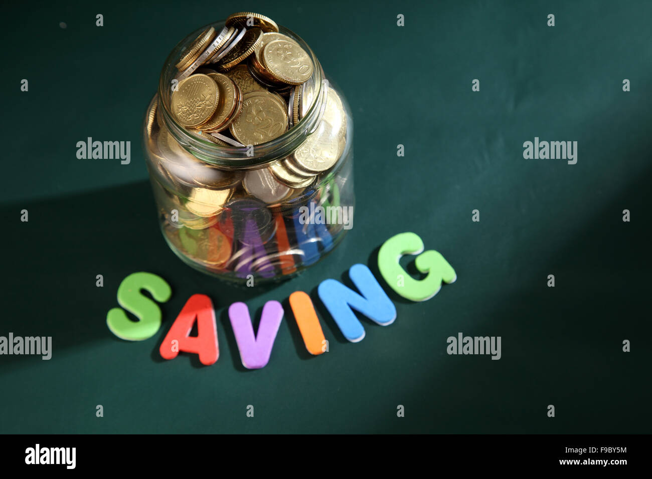concept image saving for education Stock Photo - Alamy