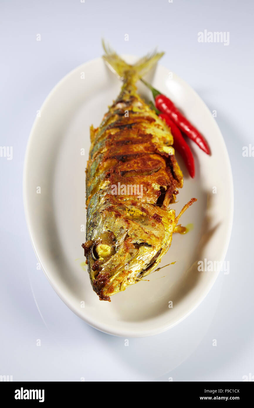 deep fried of fish marinated with turmeric powder Stock Photo - Alamy