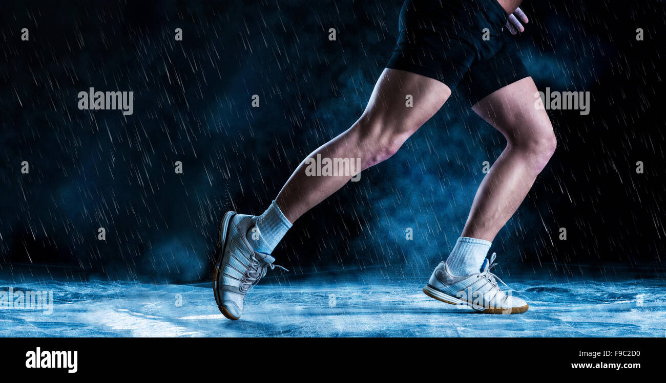 Detail of runne feet running in misty dark Stock Photo - Alamy