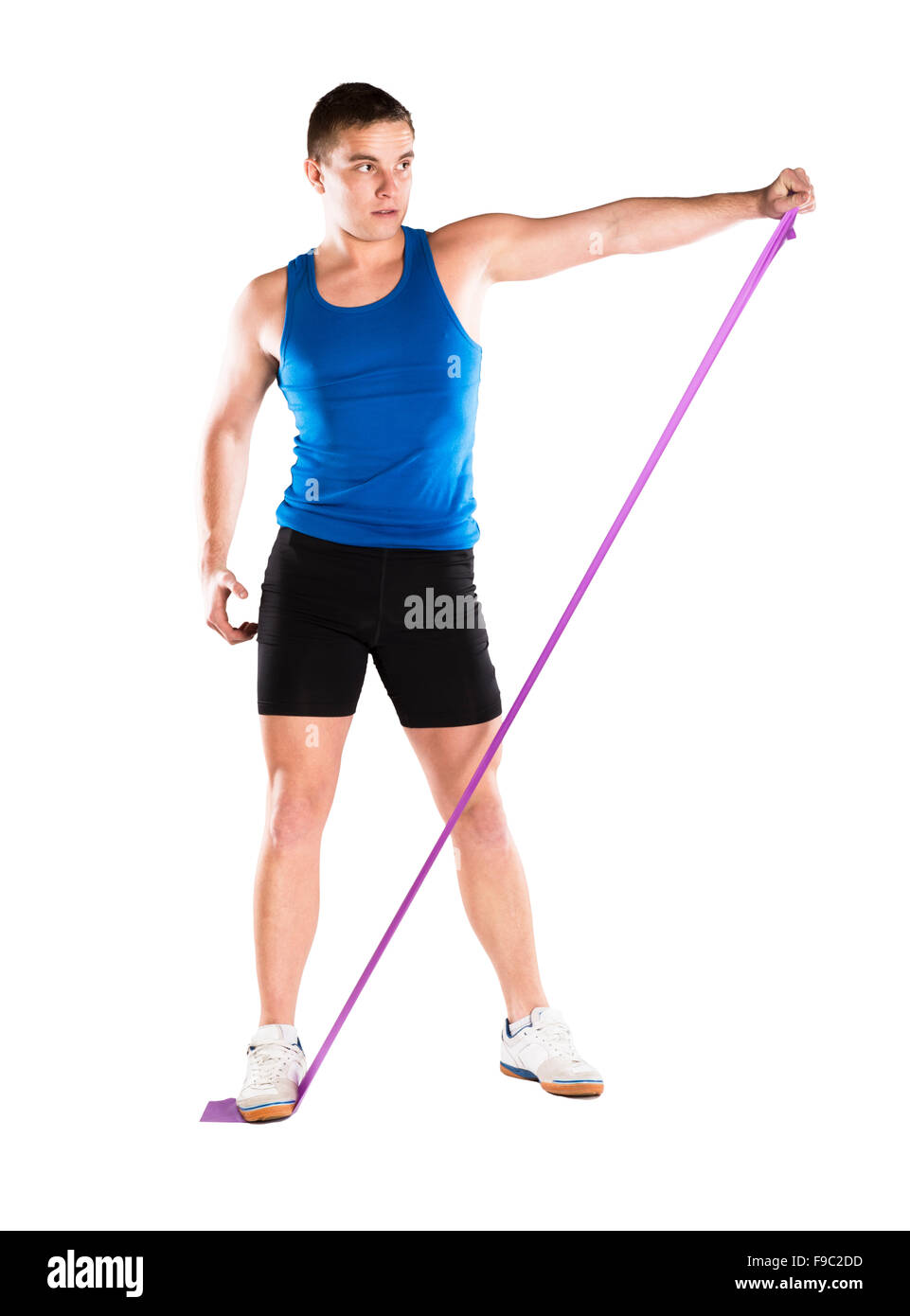 Young athlete doing exercises with a resistance band Stock Photo - Alamy