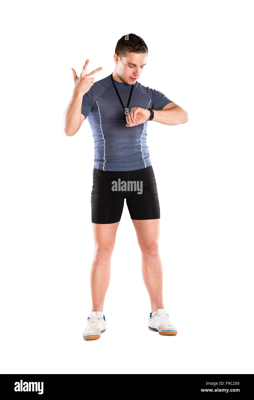 Professional fitness coach isolated on white background Stock Photo - Alamy