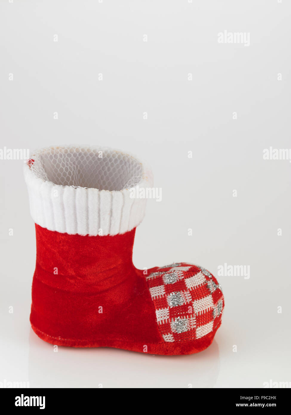 santa boot or shoe on white background Stock Photo - Alamy