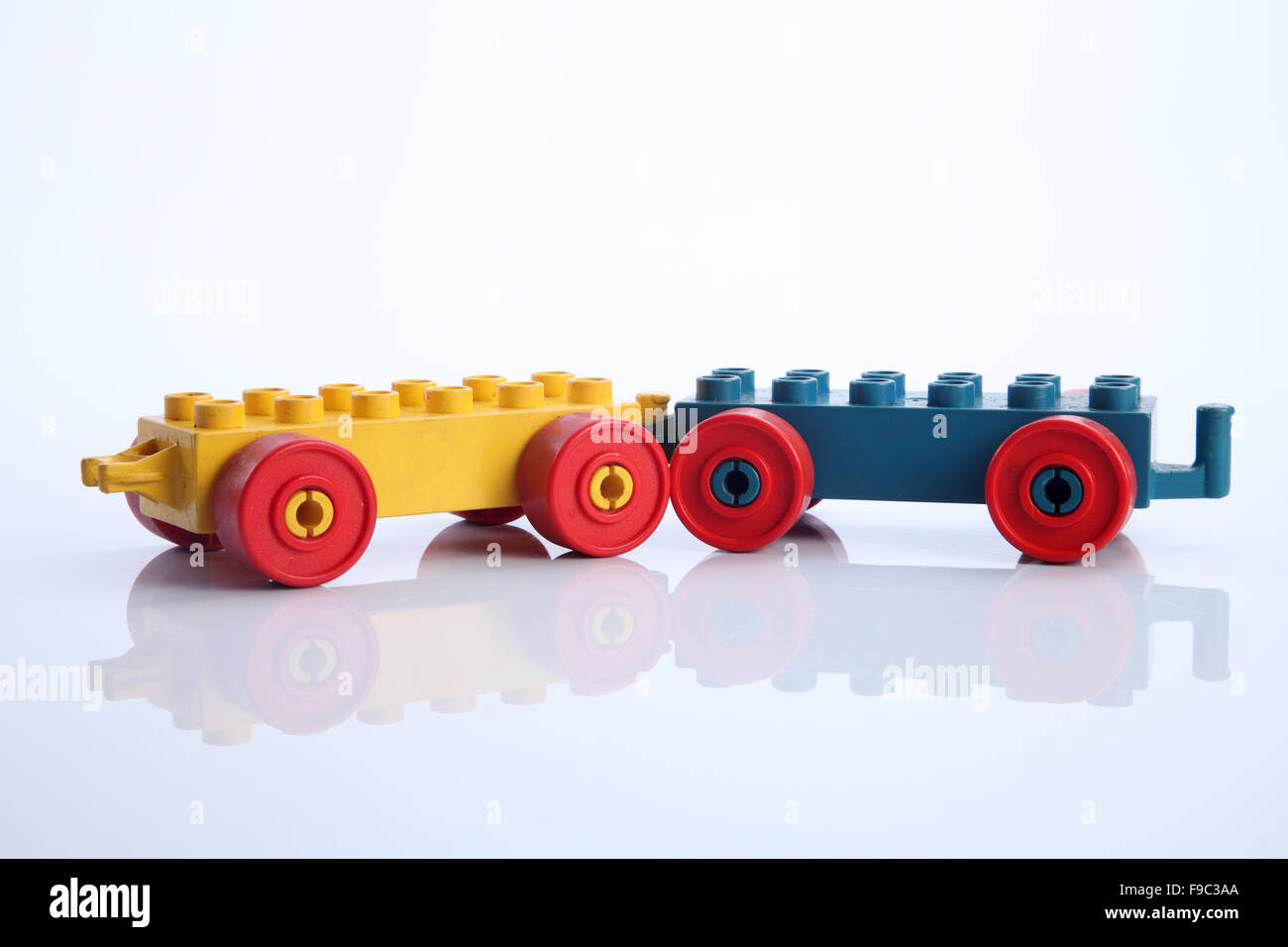 lego piece with wheel on the white background Stock Photo - Alamy