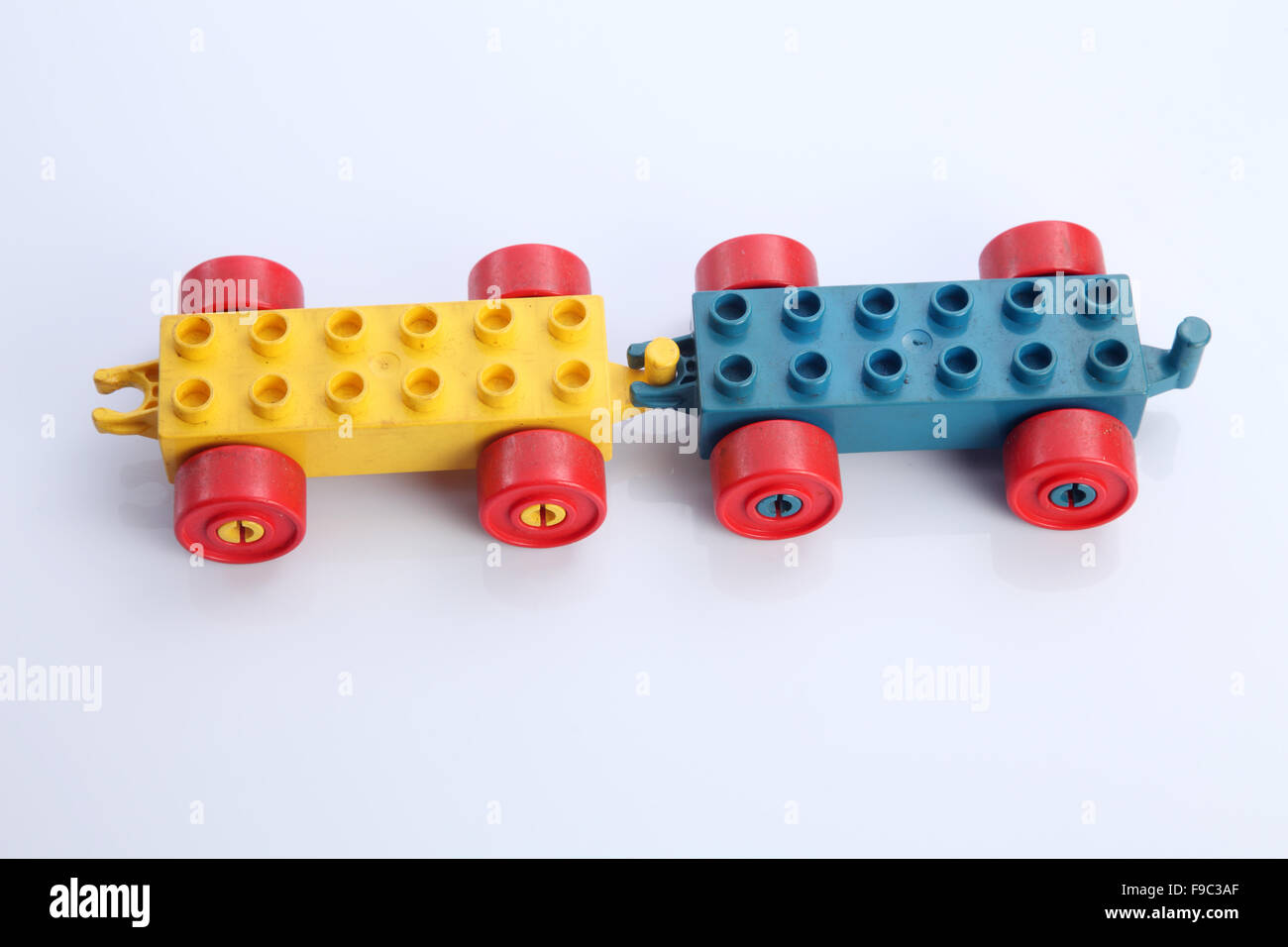 lego piece with wheel on the white background Stock Photo - Alamy