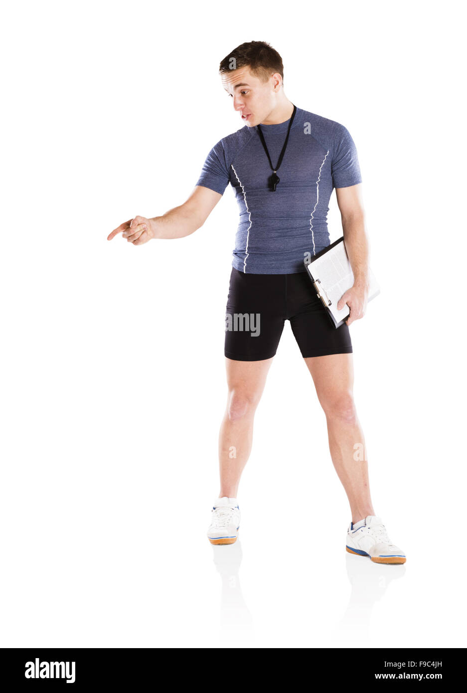 Professional fitness coach isolated on white background Stock Photo - Alamy