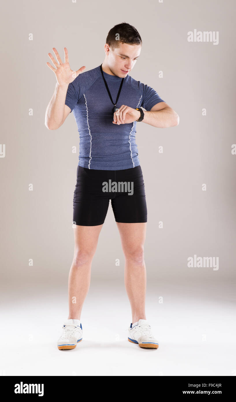 Young professional fitness coach standing in studio Stock Photo - Alamy