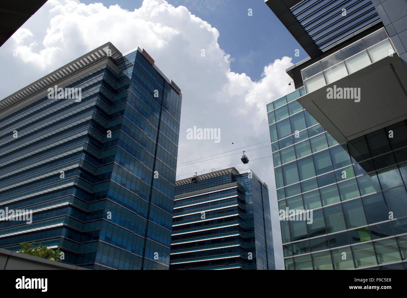 a rope-way and highrise skyscrapers near santosa island in singapore ...