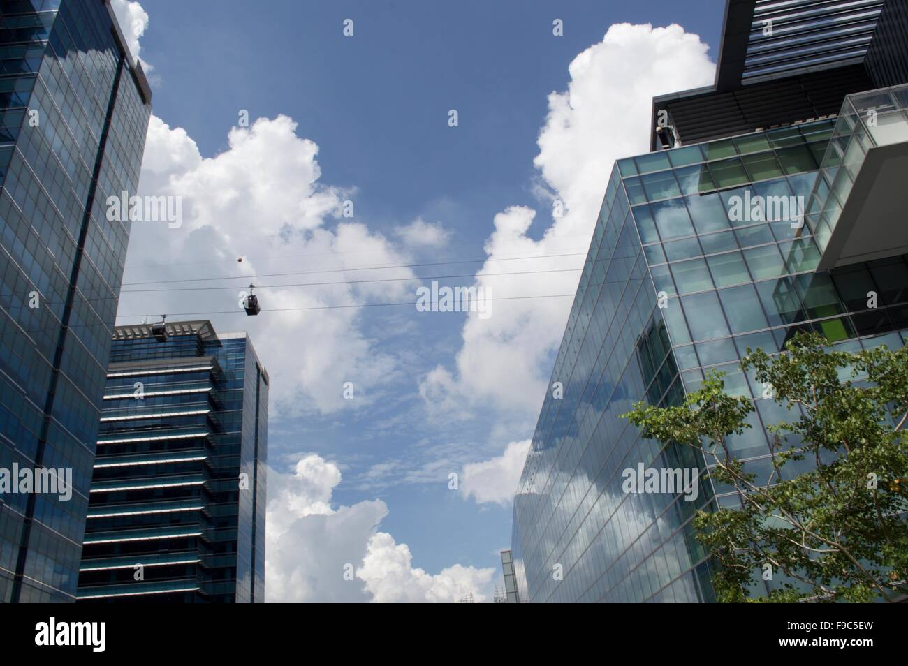 a rope-way and highrise skyscrapers near santosa island in singapore ...