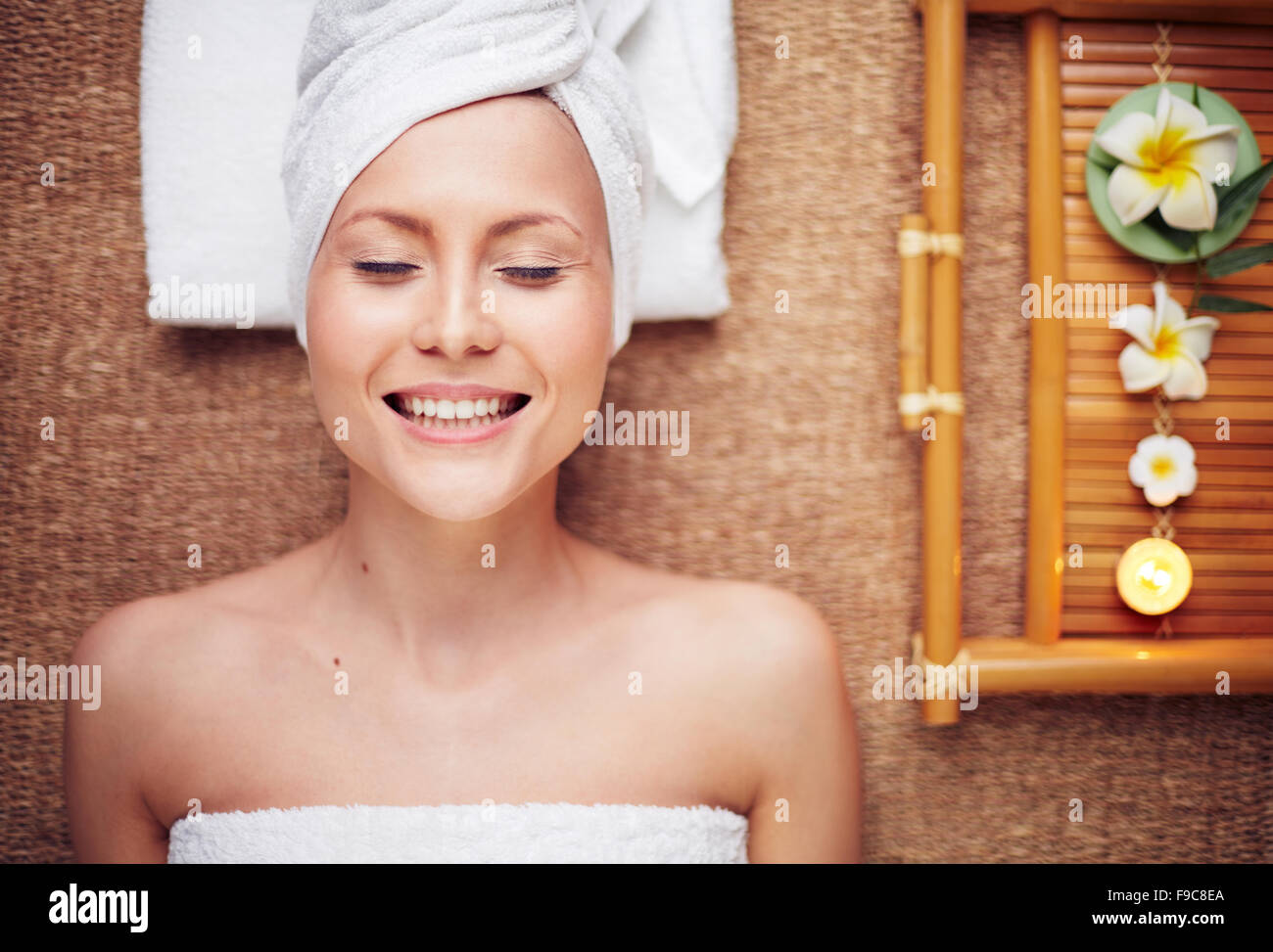 Satisfied woman relaxing during spa procedure Stock Photo - Alamy