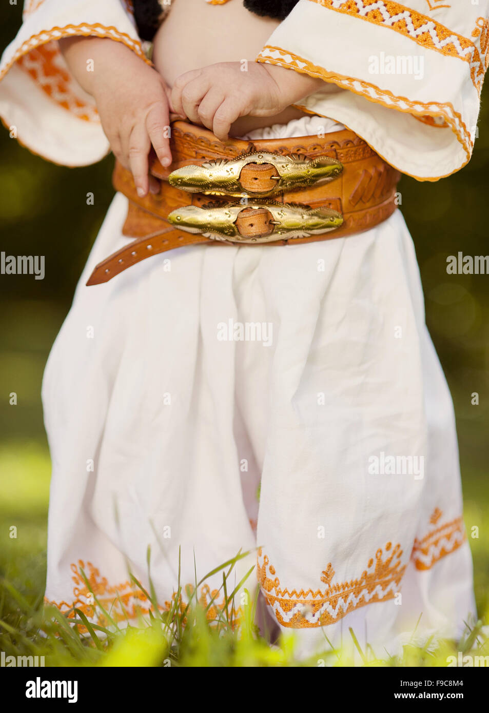 Cute child in folk costume from Easten Europe Stock Photo - Alamy