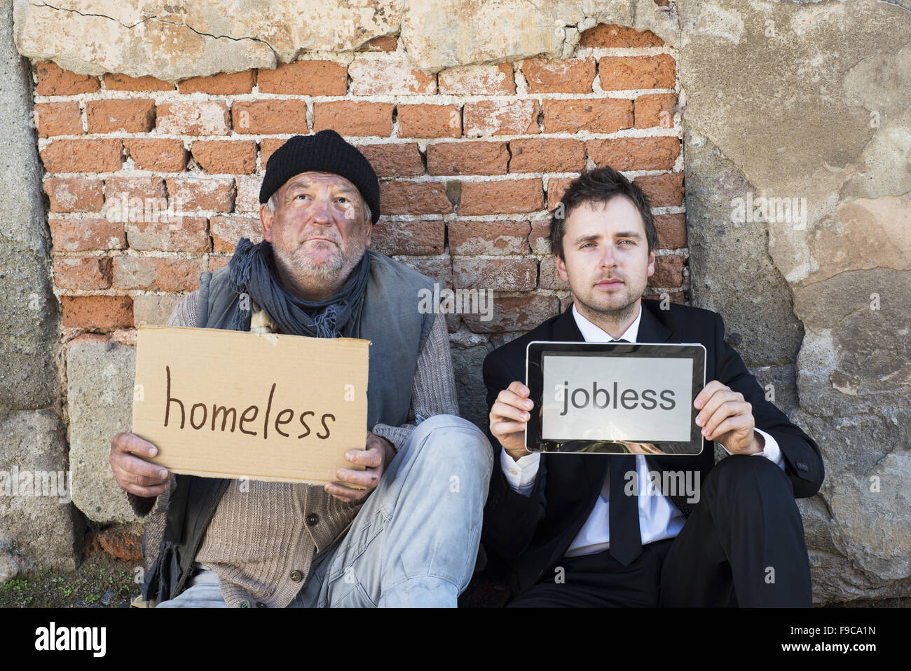 homeless men are begging on the street Stock Photo - Alamy