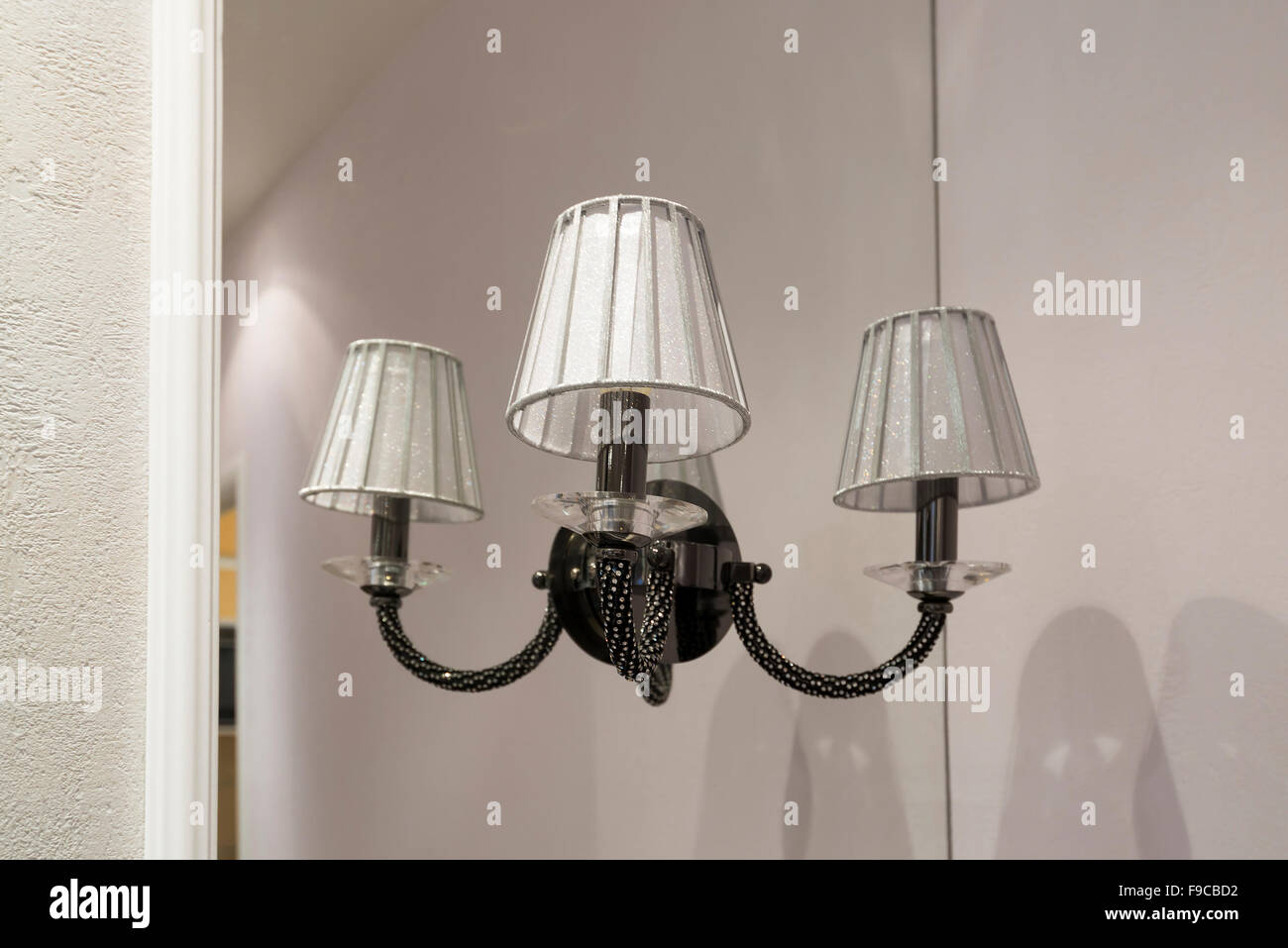 Bra hanging on the wall in interior mirror Stock Photo - Alamy