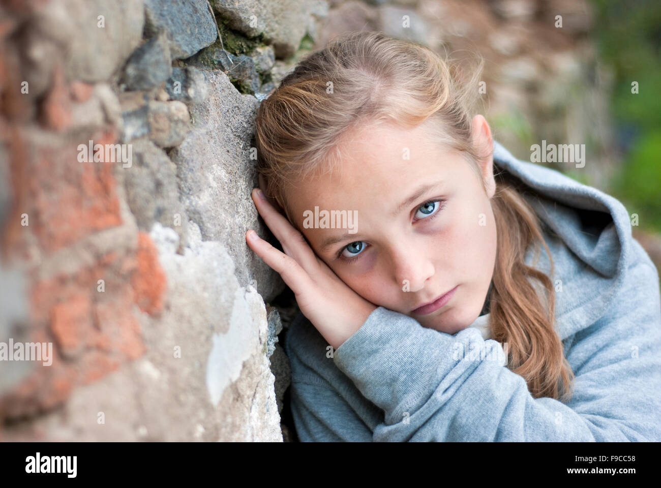 Little sad child in outdoor Stock Photo - Alamy
