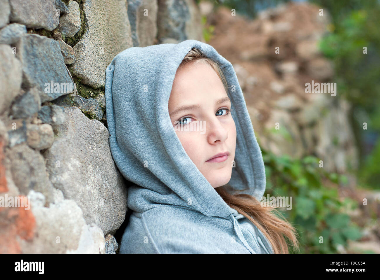 Little sad child is lonesome Stock Photo - Alamy