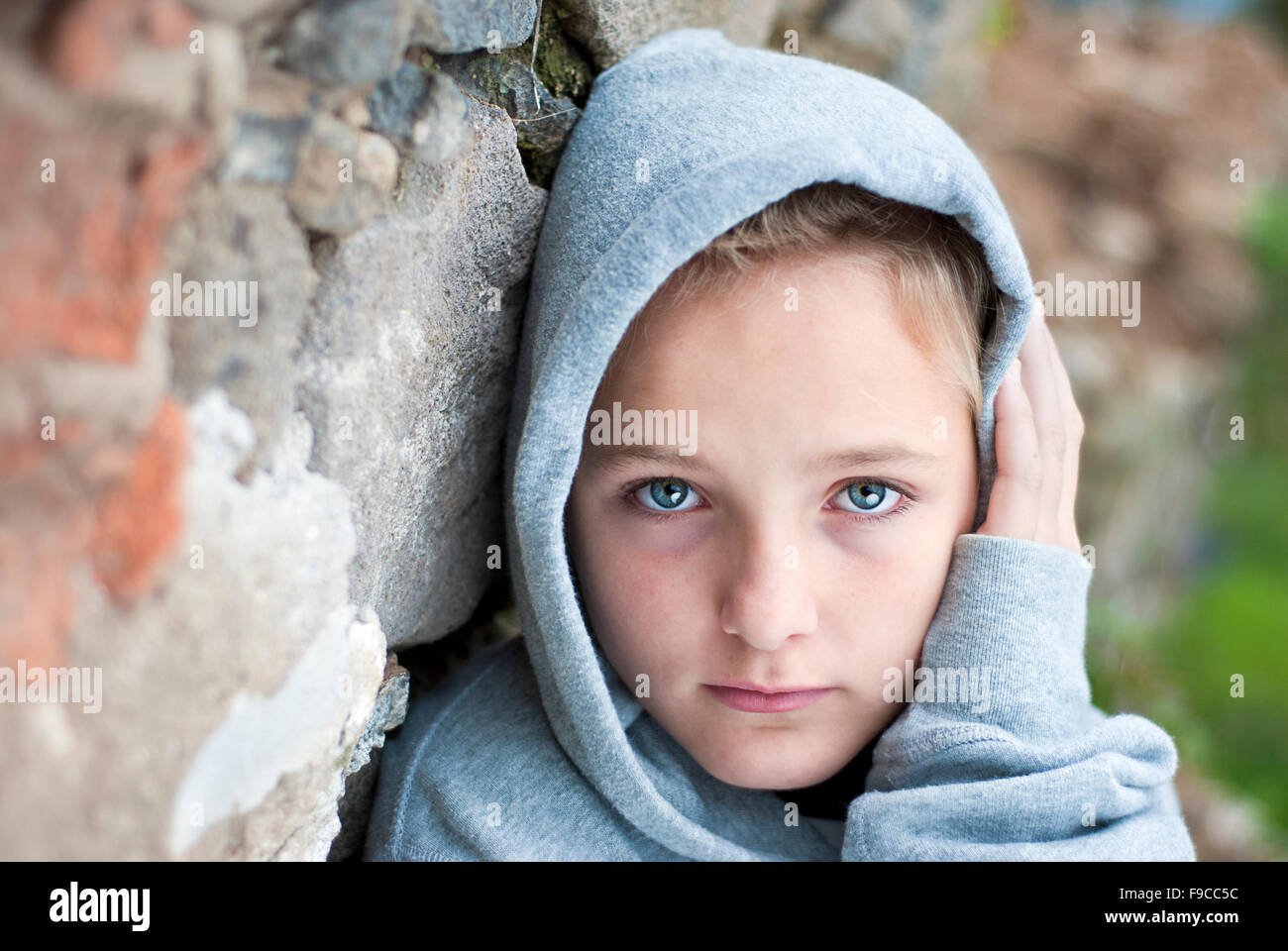 Little sad child is lonesome Stock Photo - Alamy