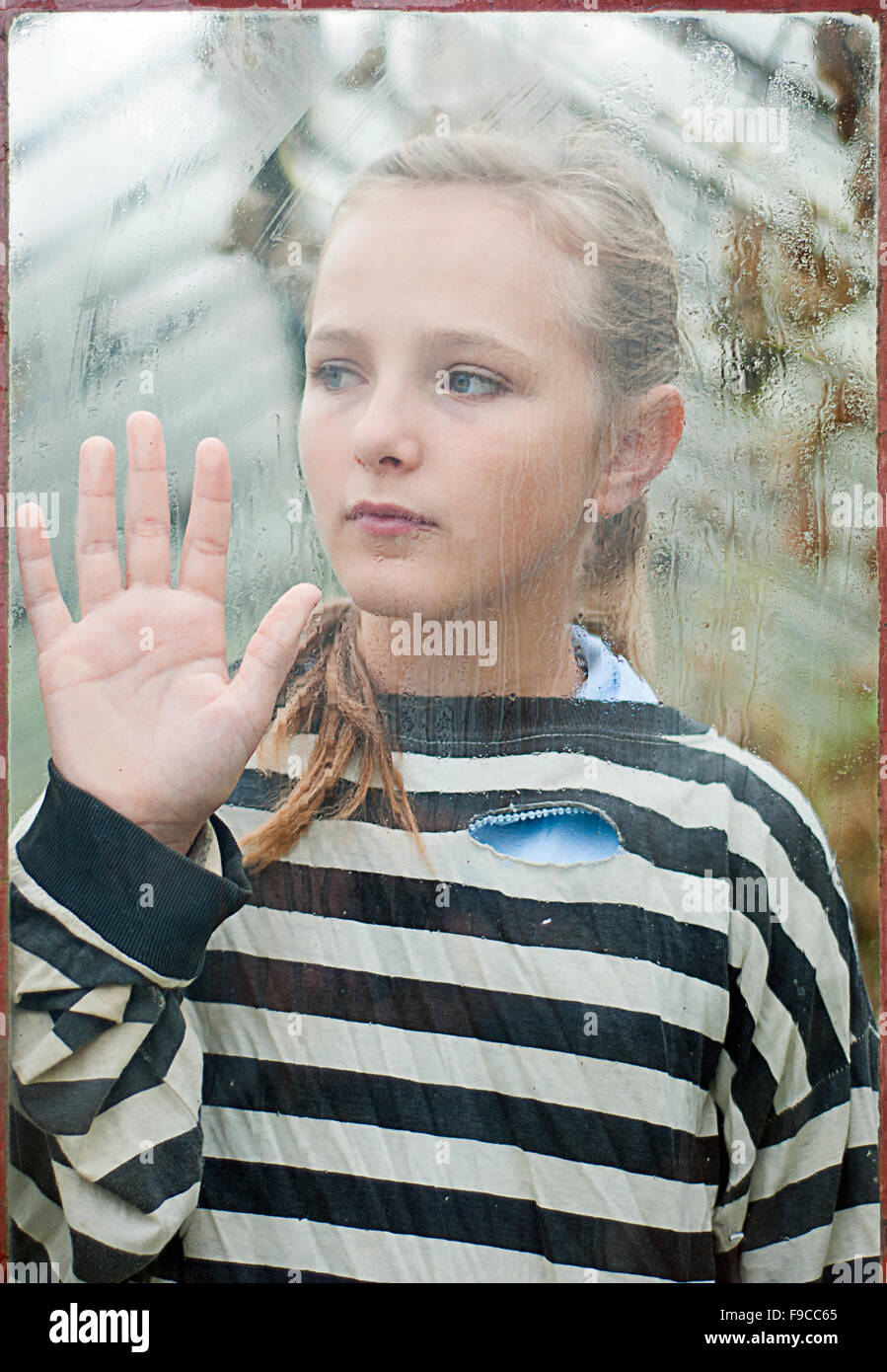 Sad young girl feels lonely Stock Photo - Alamy