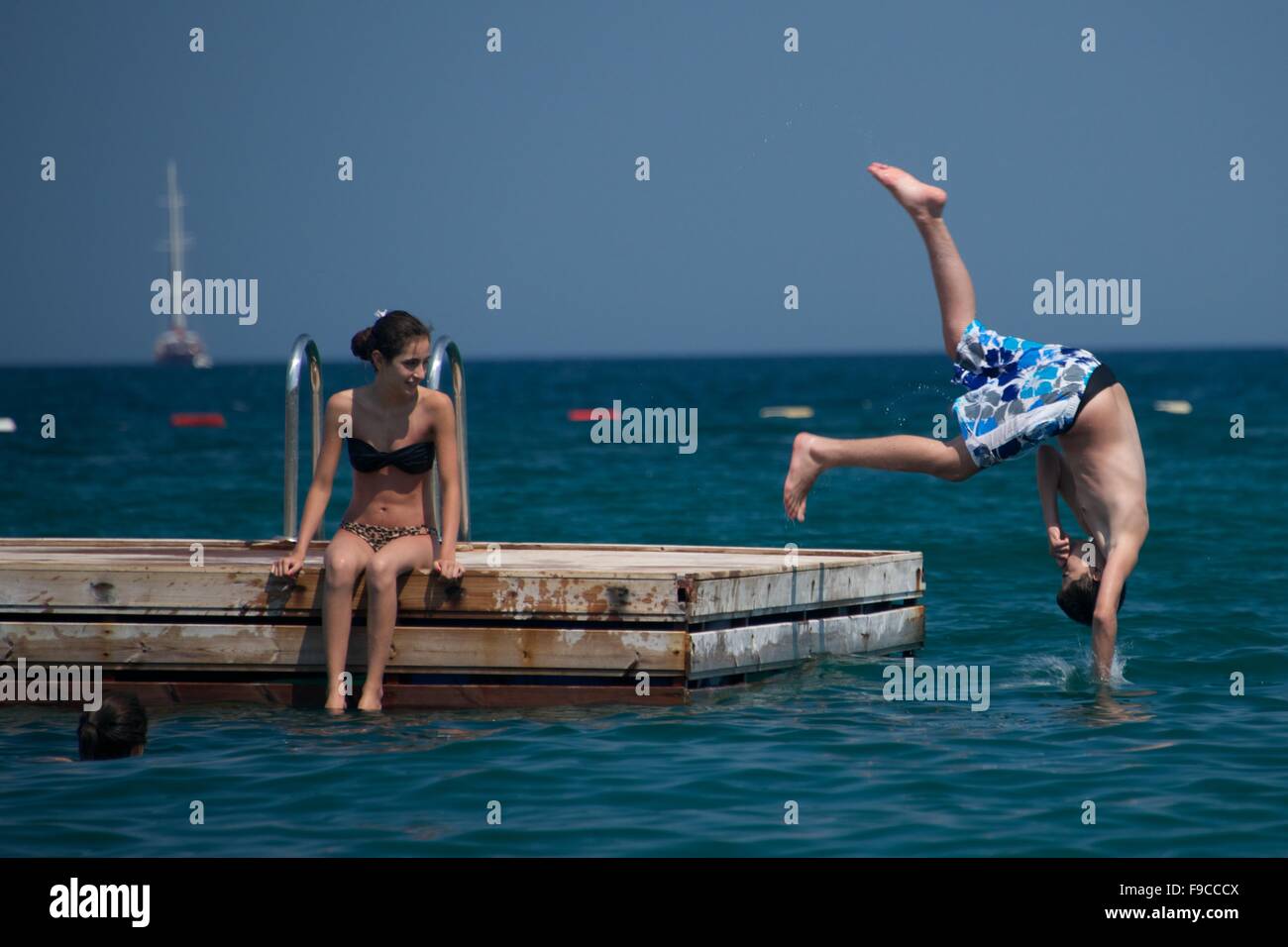 Boy doing somersault hi-res stock photography and images - Alamy