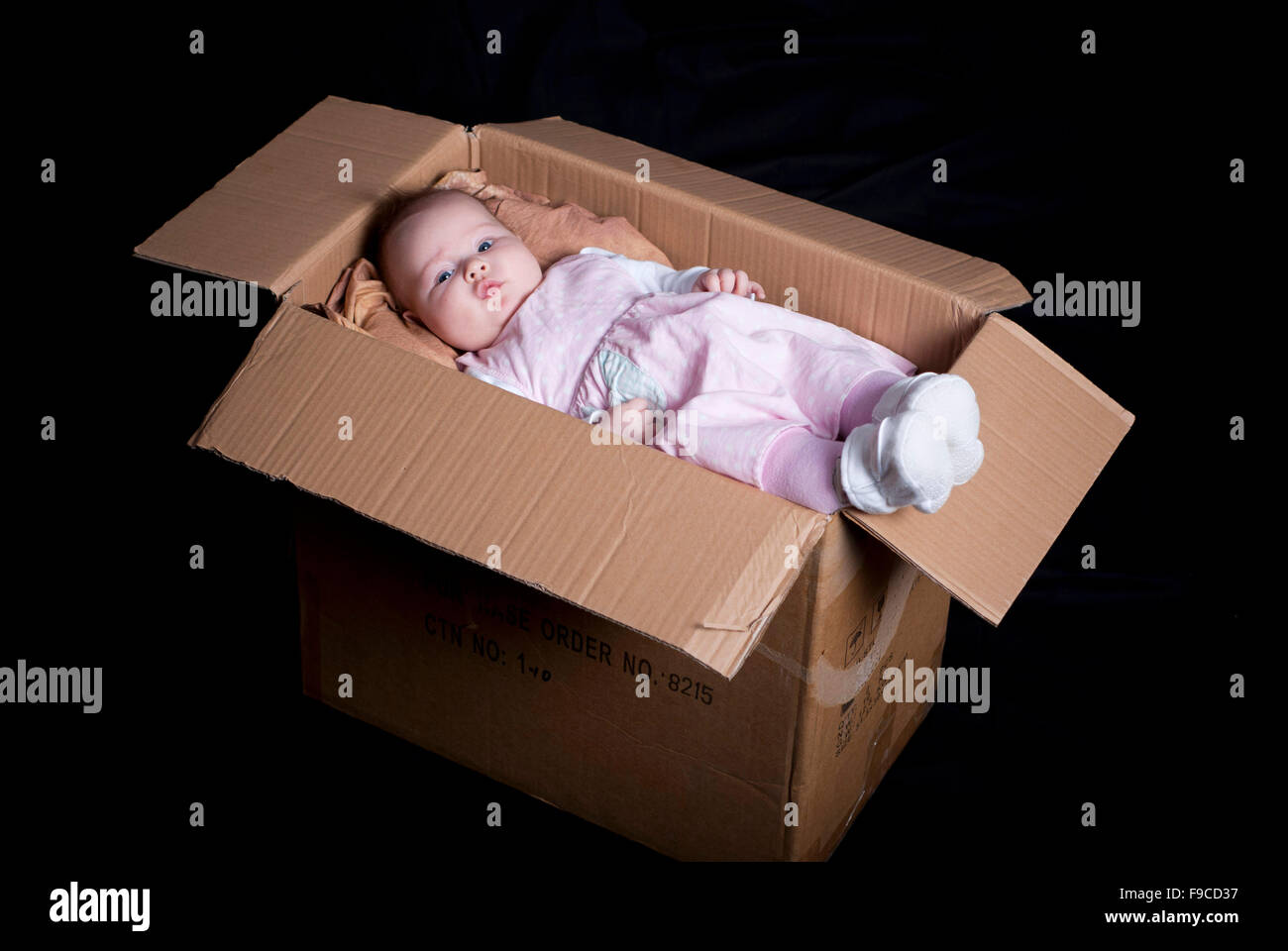 Baby in the box hi-res stock photography and images - Alamy