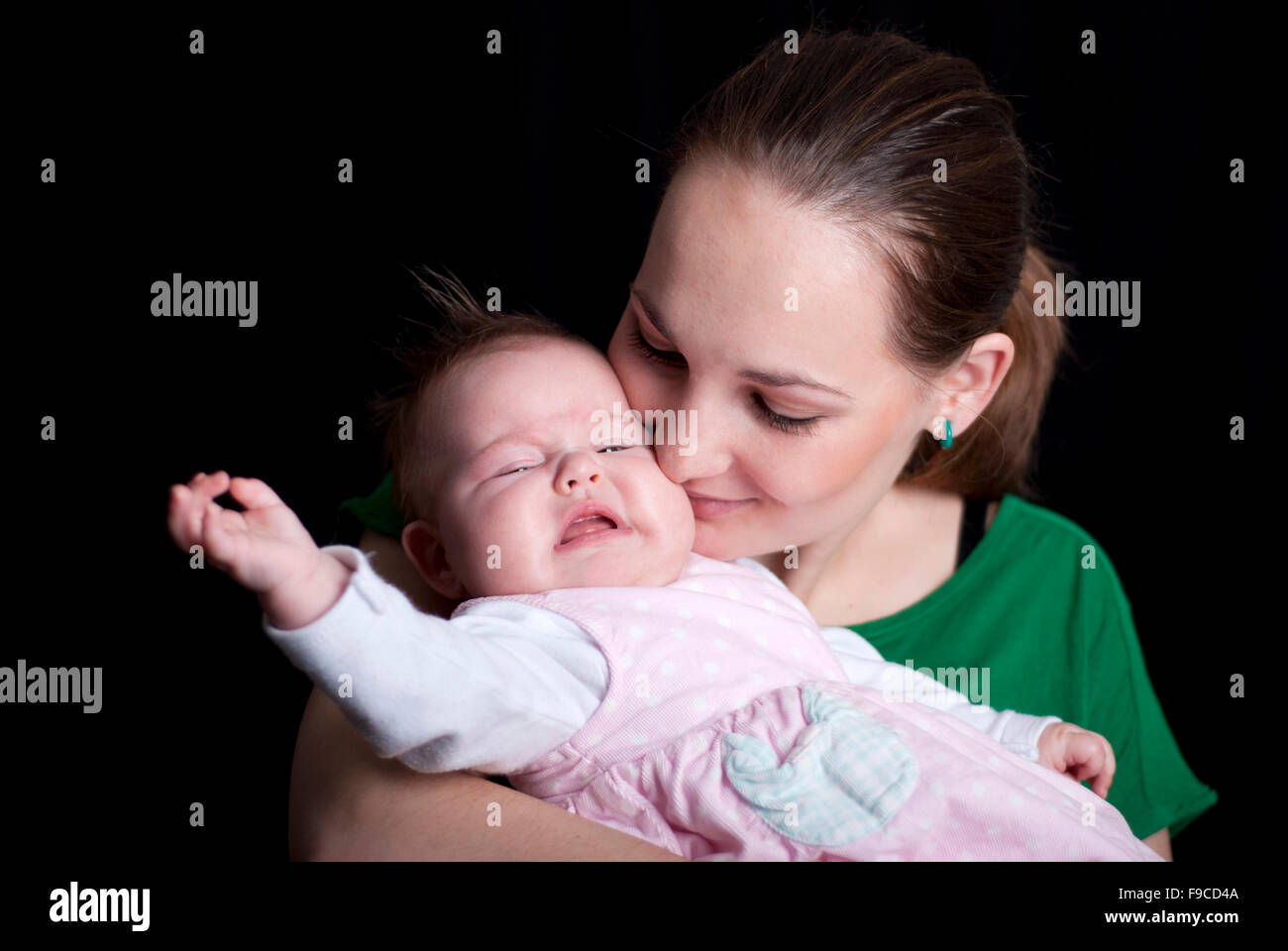 Woman holding newborn baby scared hi-res stock photography and images ...