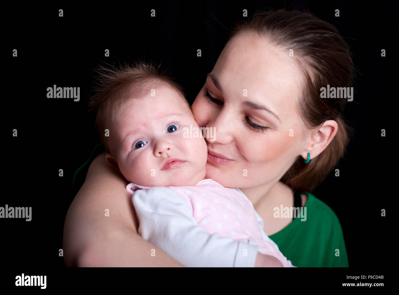 Little baby is with her mother Stock Photo - Alamy