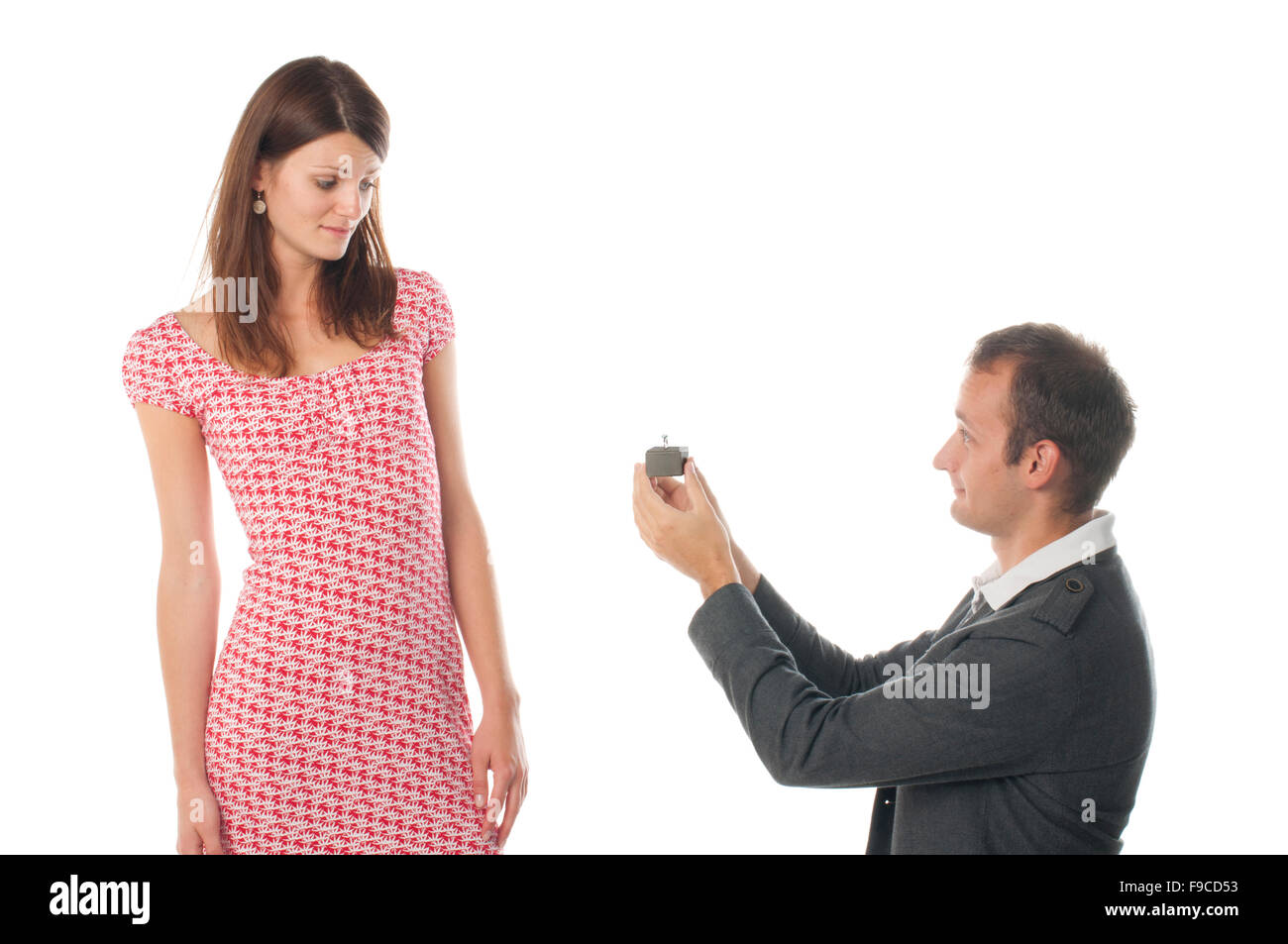 Proposal scene with sad woman and man Stock Photo - Alamy
