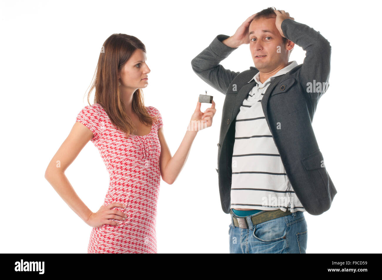 Proposal scene with happy woman and sad man Stock Photo - Alamy