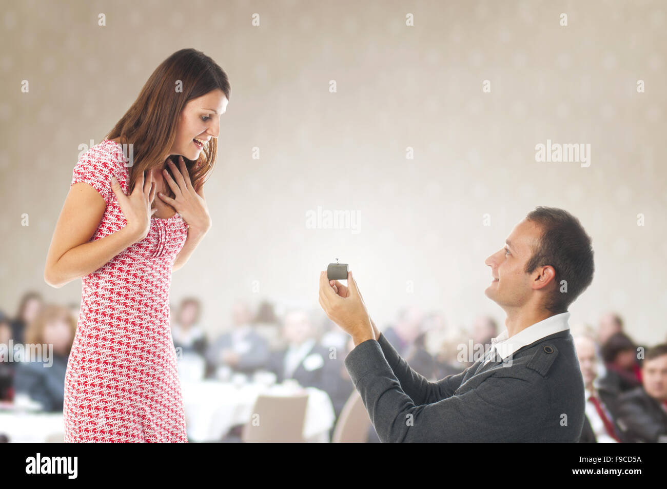 Romantic proposal scene with happy woman and man Stock Photo - Alamy