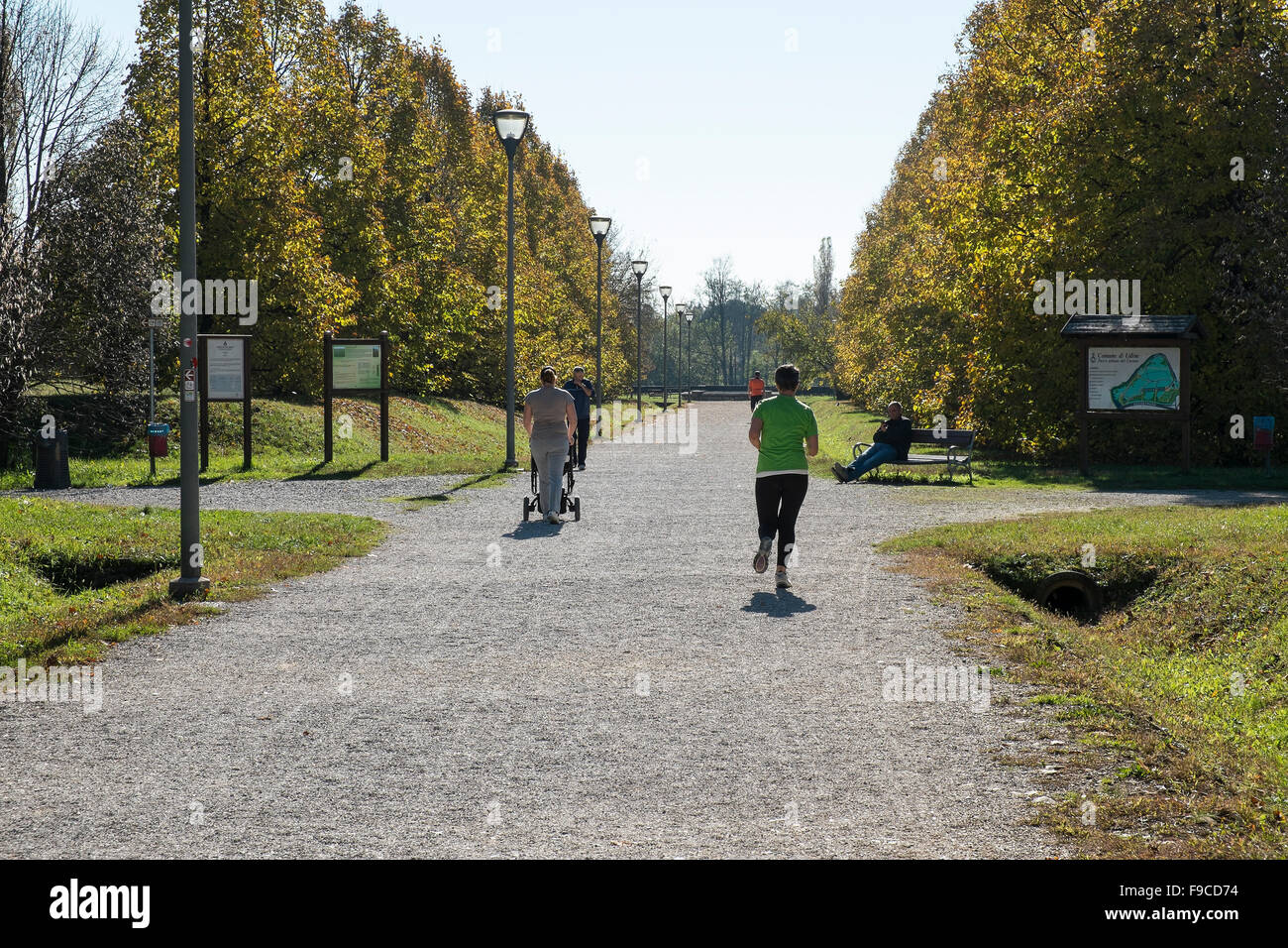Female jogger walking in autumn hi-res stock photography and images - Alamy